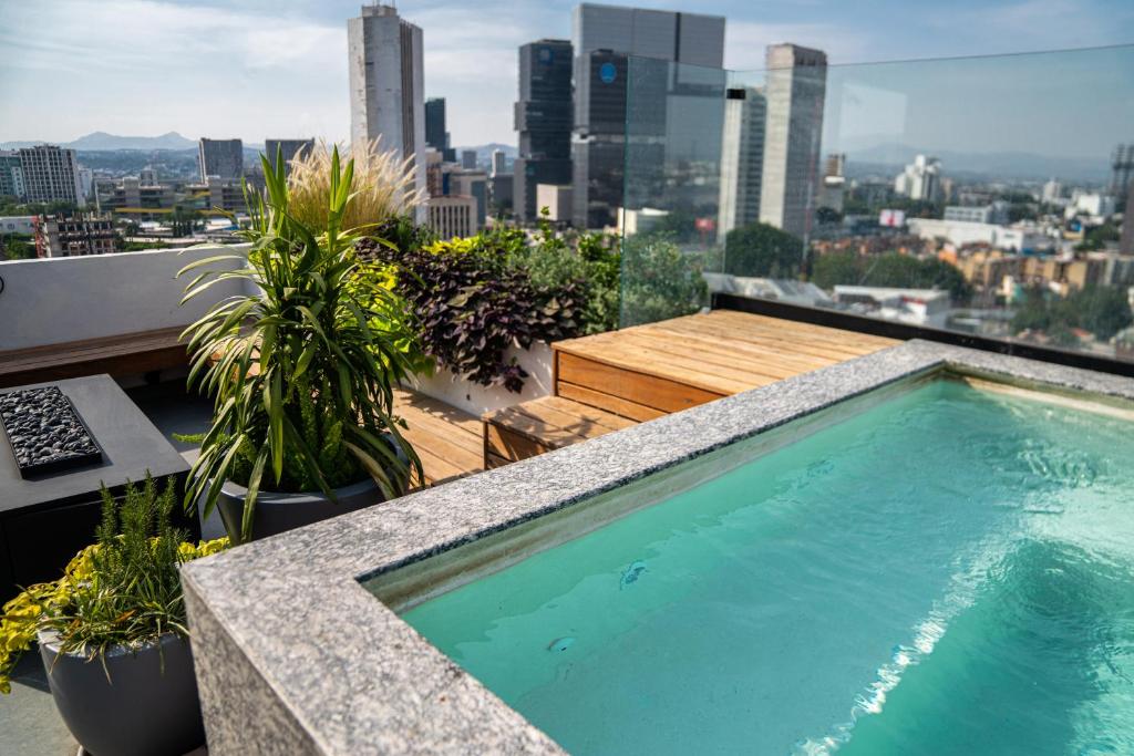 Downtown Finance, Jacuzzi, Rooftop, Best Wifi M01,瓜达拉哈拉（2025年最新房价）