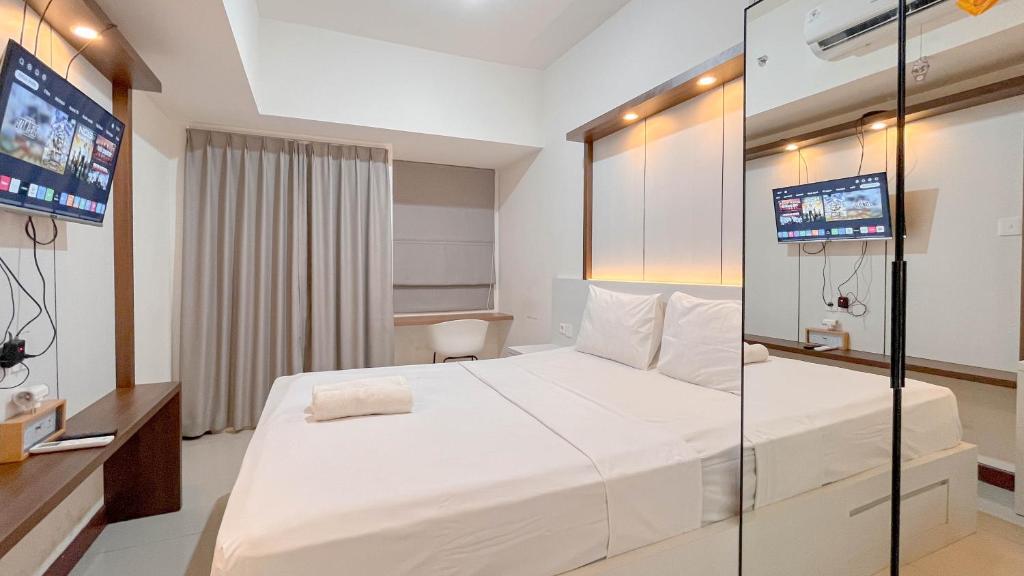 Comfort Studio Room at Vida View Apartment By Travelio,Pampang（2025年最新房价）
